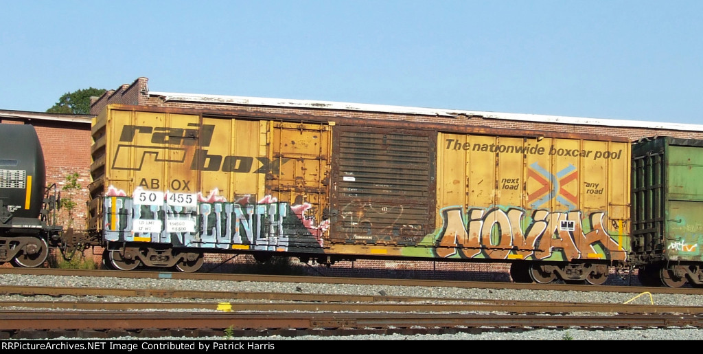 ABOX 50455 Railbox 50 exterior-post combination-door box car moving downgrade southbound through ...